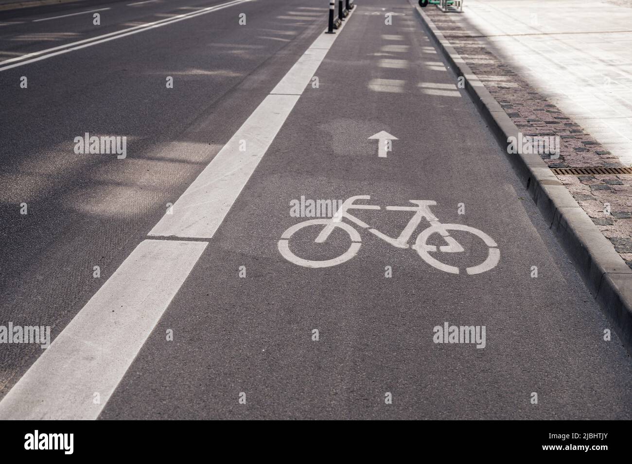 Bicycle path with bike sign and direction arrow. Separate Safe bike ...