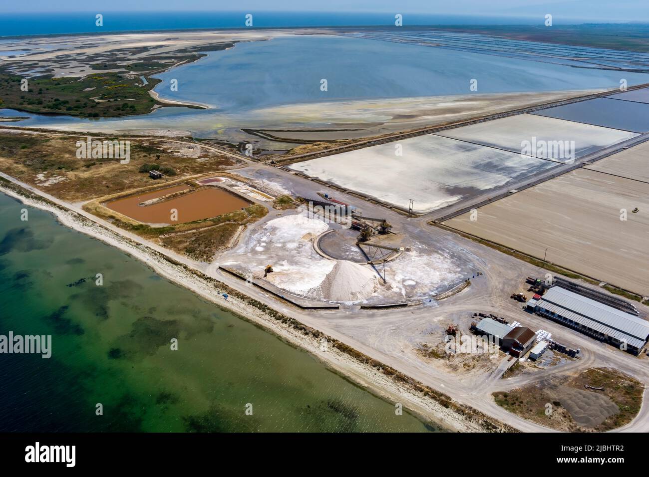 Aerial view of salt evaporation ponds and salt mounds these ponds are ...