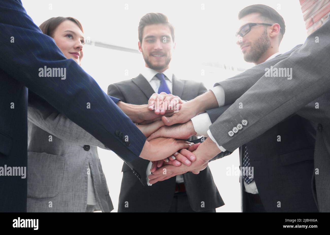Group of Friends with Hands in Stack, Teamwork Stock Photo - Alamy