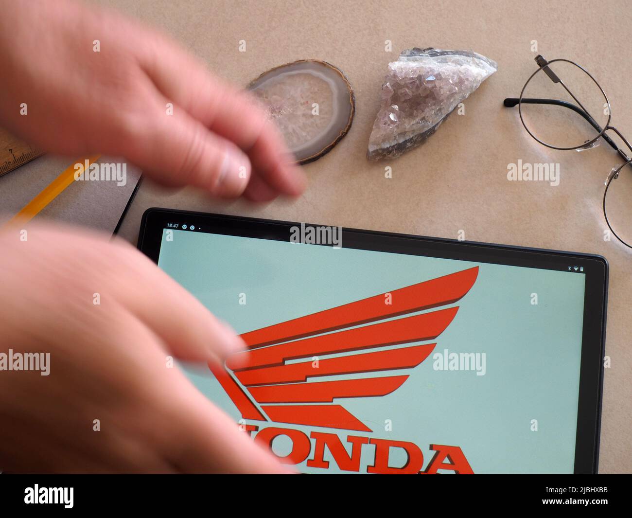 In this photo illustration Honda Motor Co., Ltd. logo seen displayed on ...