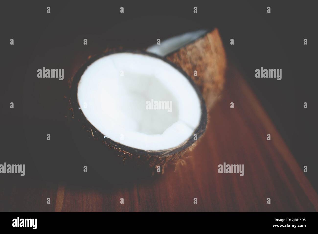 Half of coconut fruit close up Stock Photo - Alamy