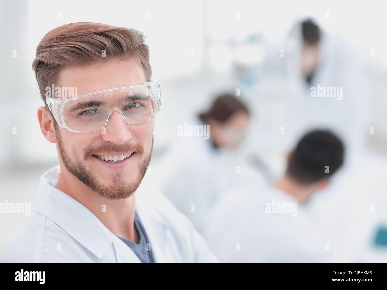 modern scientist on laboratory background Stock Photo - Alamy