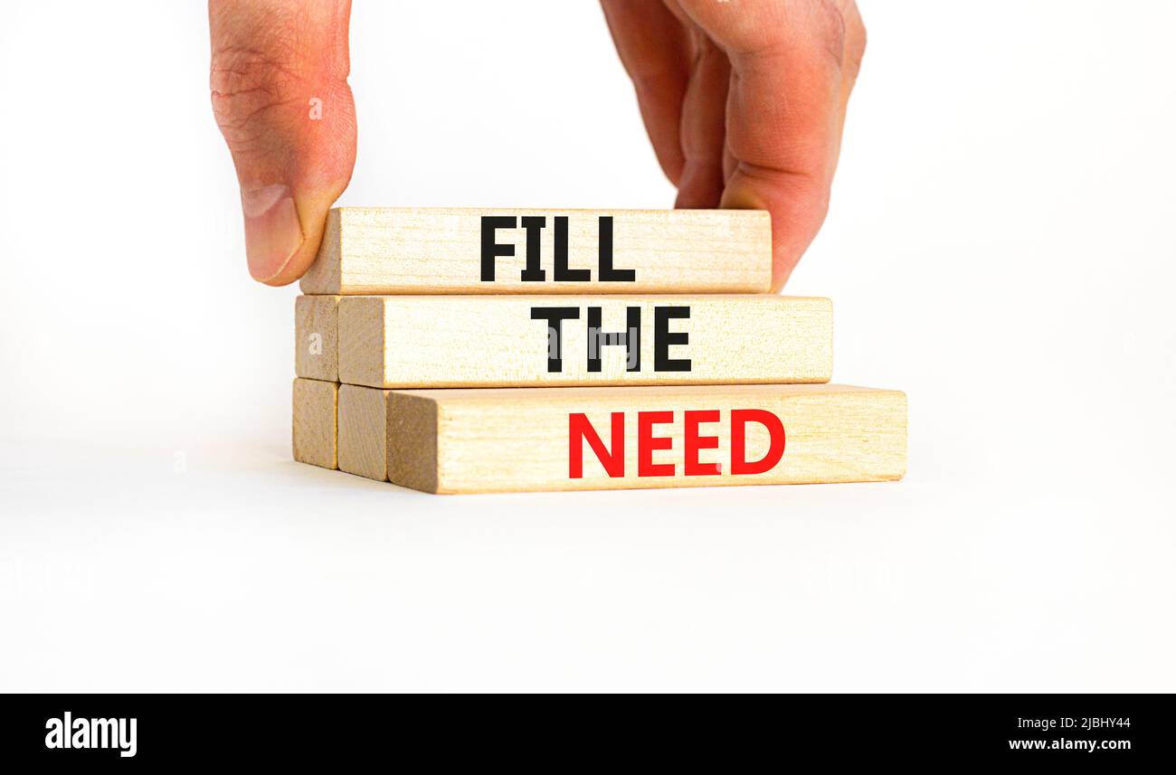 Fill the need symbol. Concept words Fill the need on wooden blocks on a ...