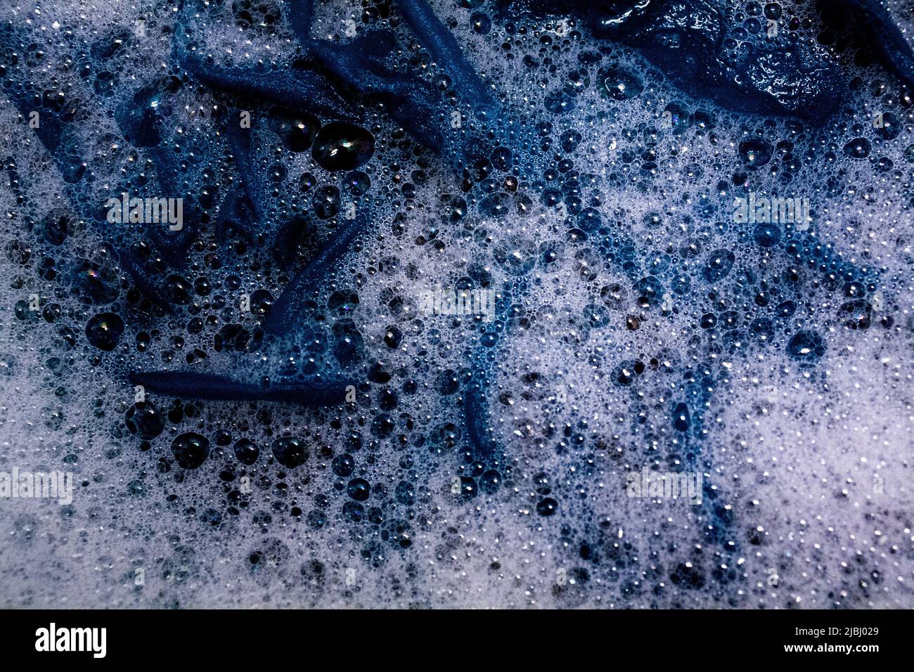 Fabric, Dye, Water and Bubbles Stock Photo - Alamy