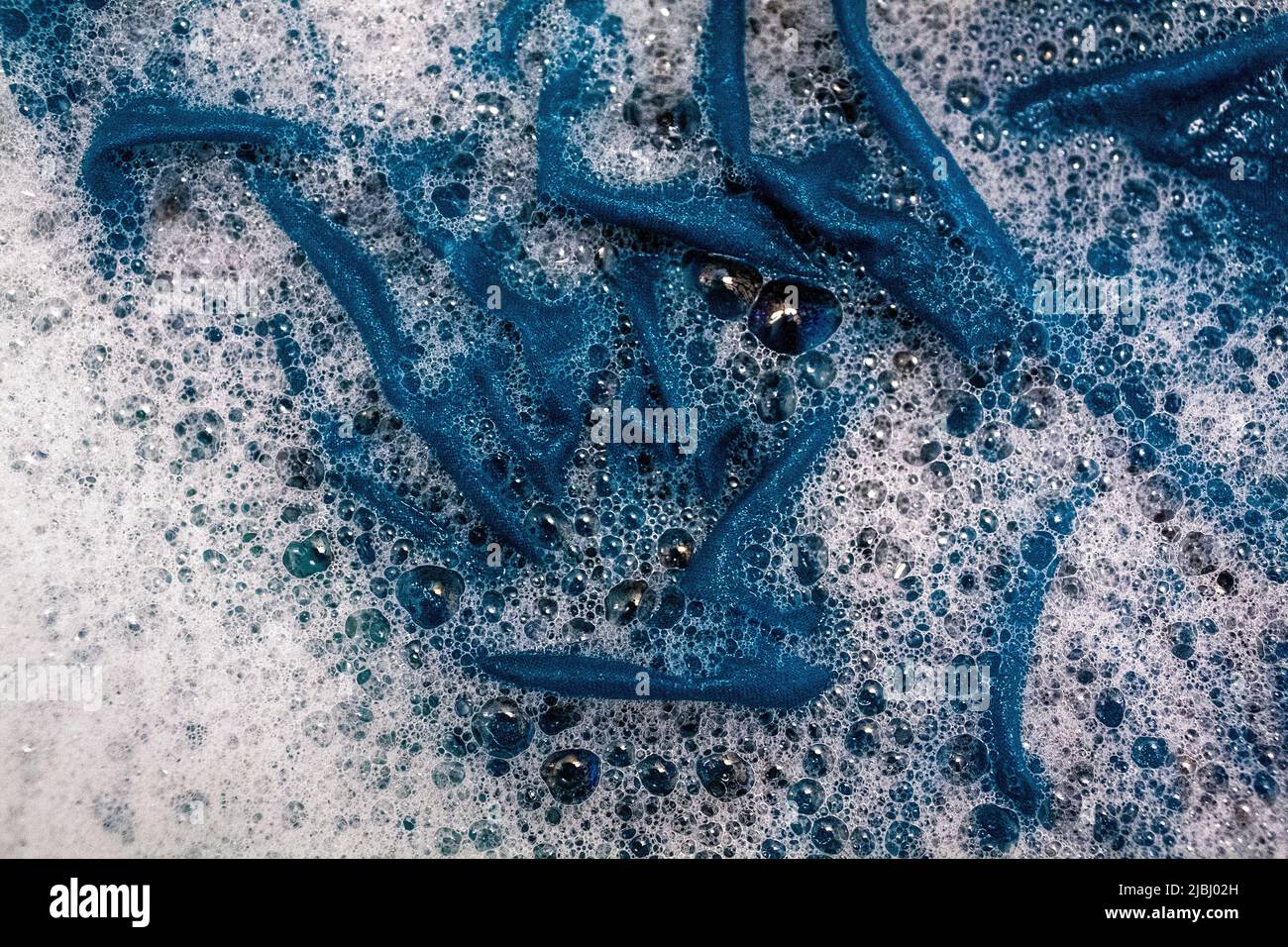 Fabric, Dye, Water and Bubbles Stock Photo - Alamy