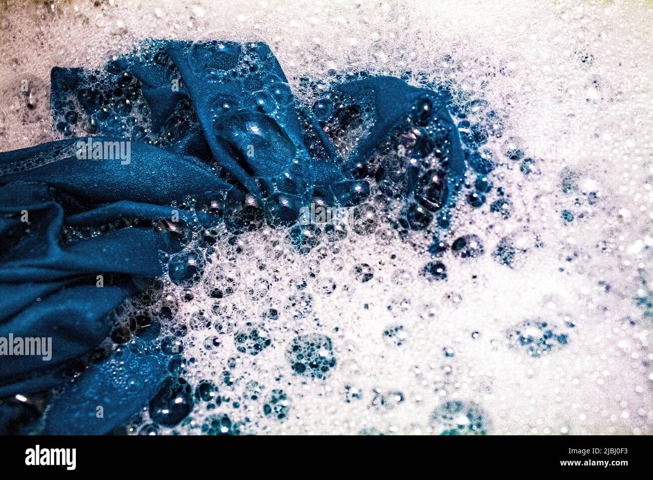 Fabric, Dye, Water and Bubbles Stock Photo - Alamy