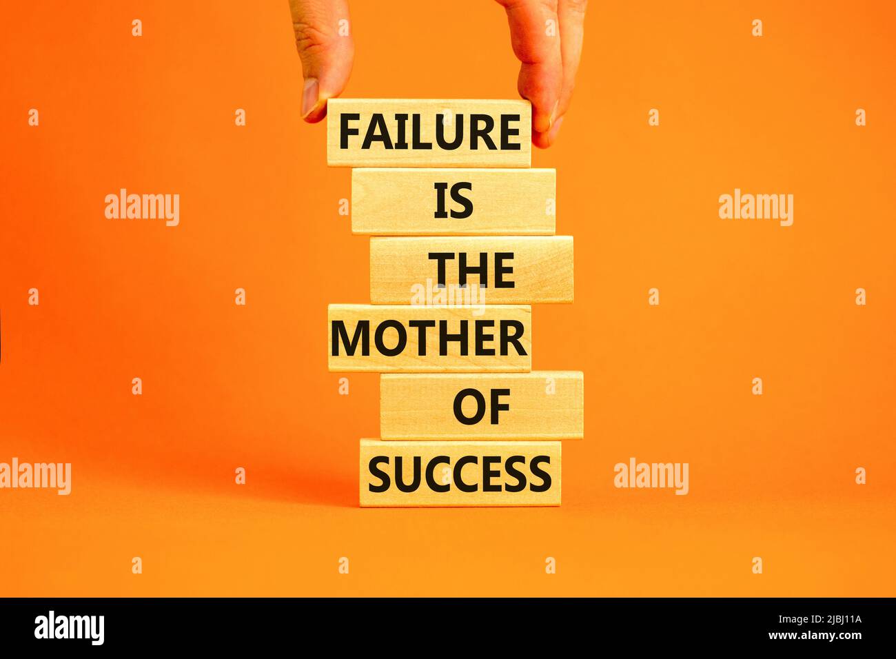Failure or success symbol. Wooden blocks with words A failure is the ...