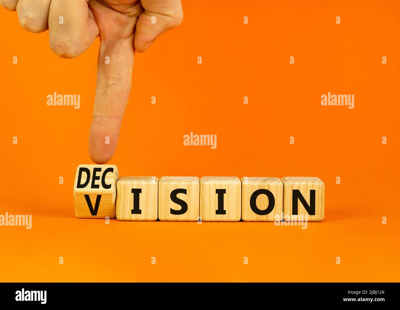 Vision and decision symbol. Businessman turns wooden cubes and changes ...
