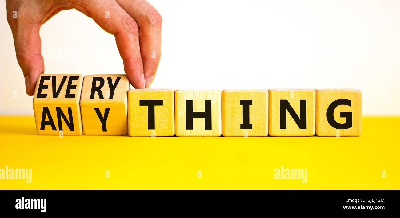 Anything or everything symbol. Businessman turns cubes and changes the ...