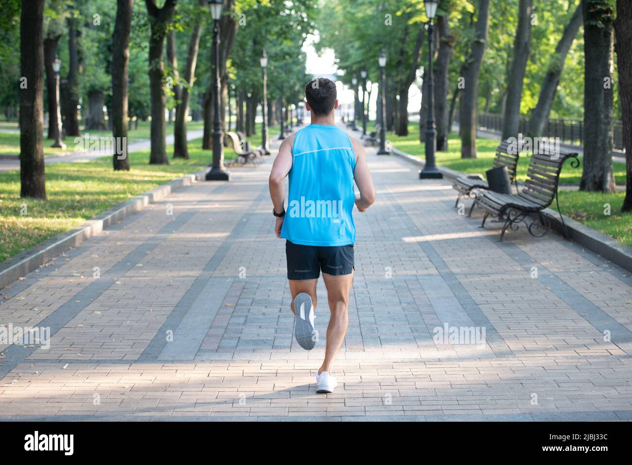 Back view running man in hi-res stock photography and images - Alamy