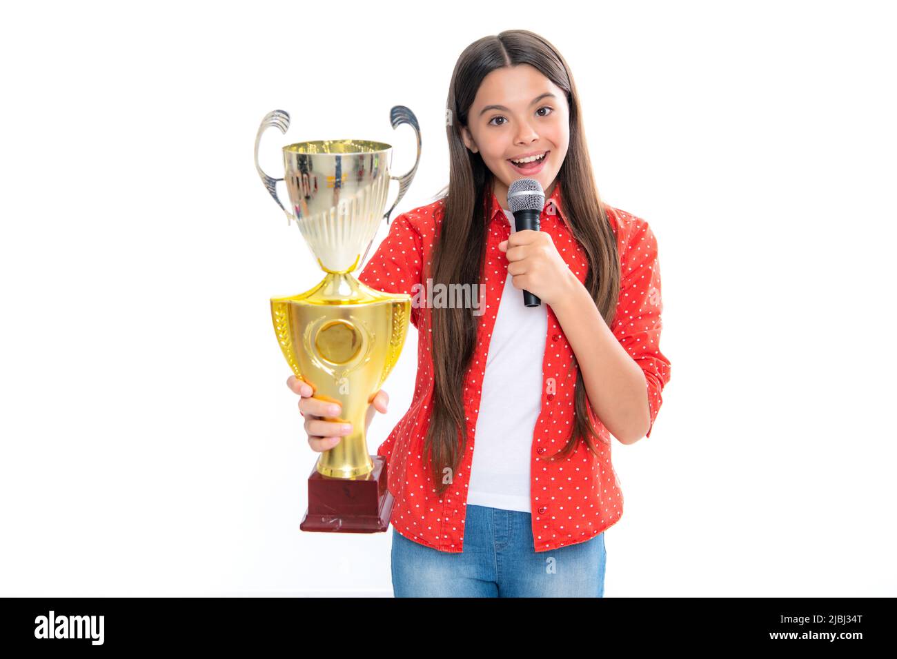 Teenage girl holding a trophy microphone speech. Kid winner child won ...