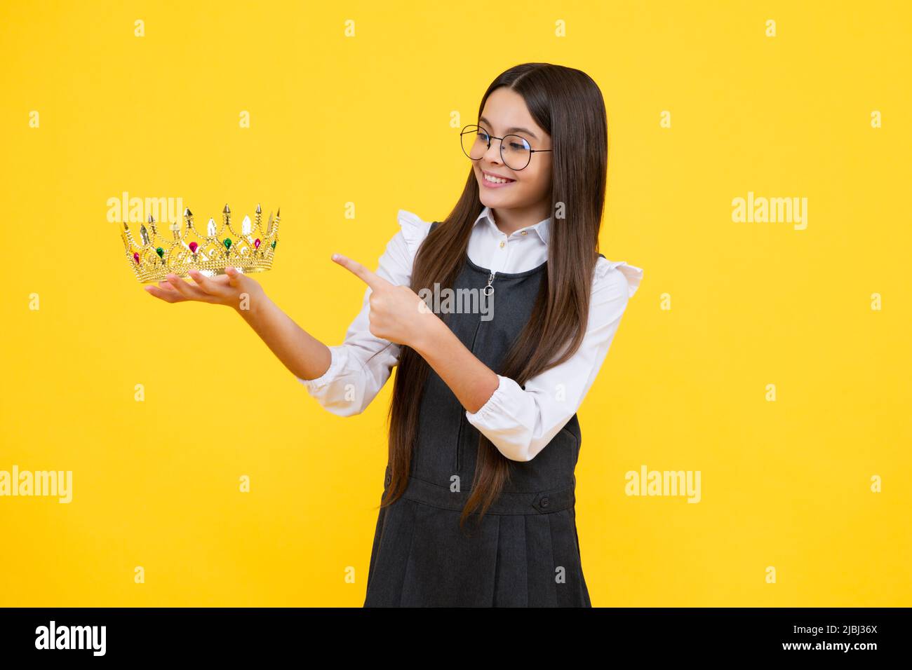 Portrait of ambitious teenage girl with crown, feeling princess ...
