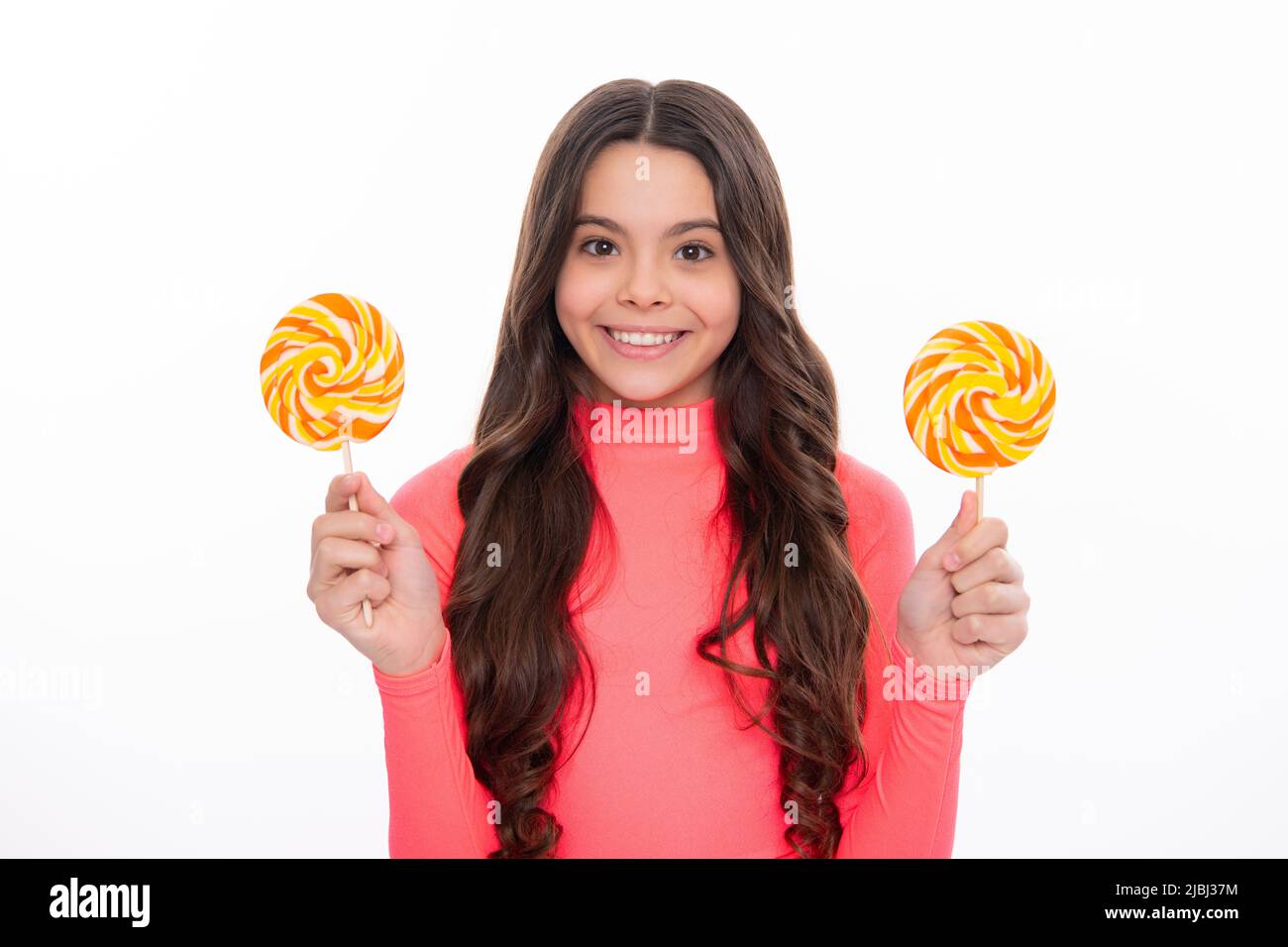 Teenager girl eating sugar lollypop. Candy and sweets for kids. Child ...