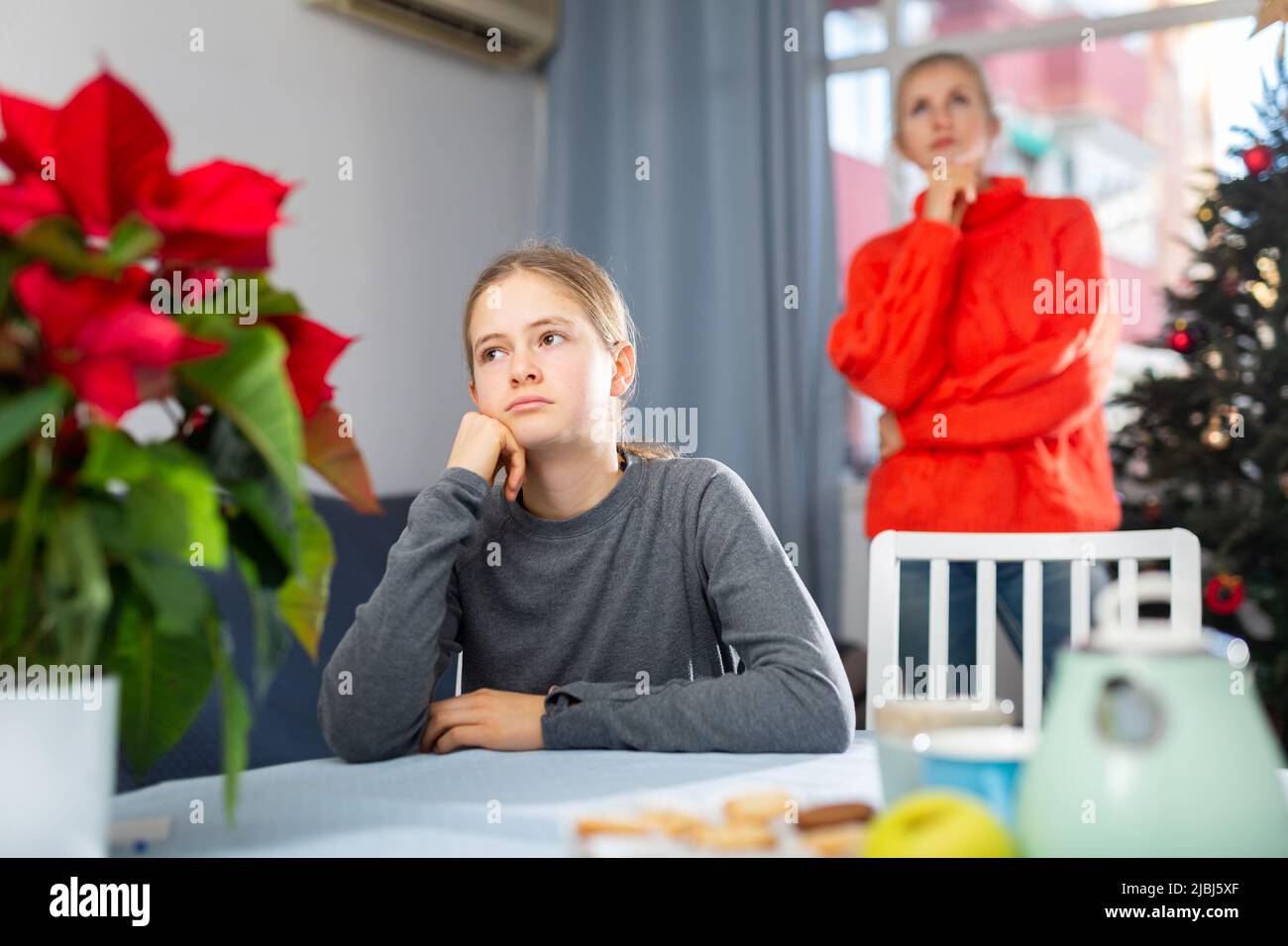 Quarrel between mom and daughter during christmas Stock Photo - Alamy