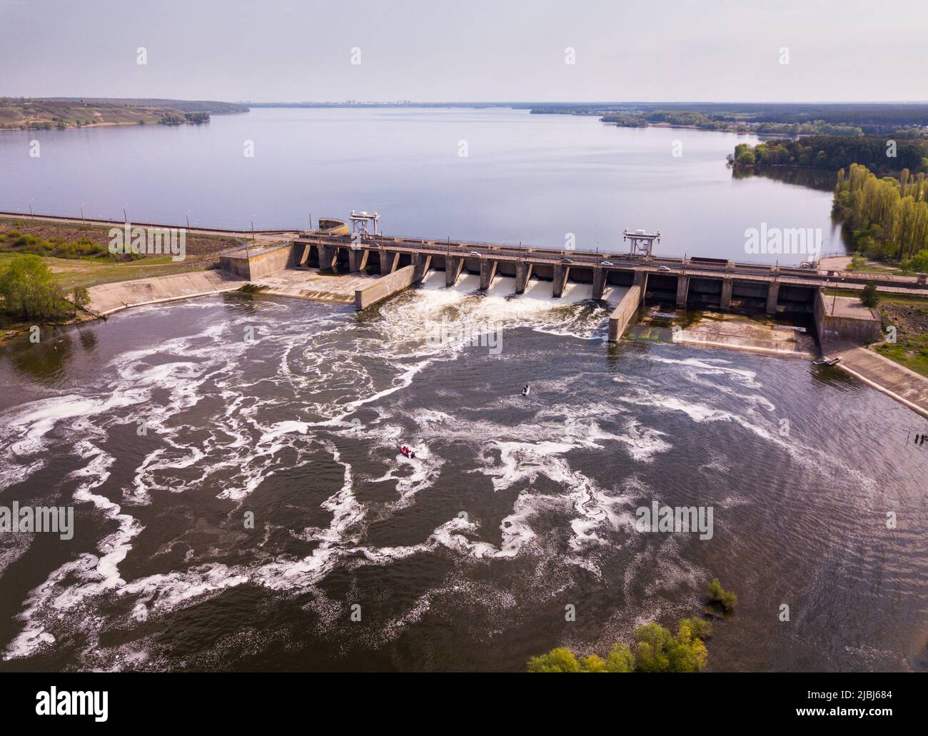 Landscape with concrete dam on river Stock Photo - Alamy