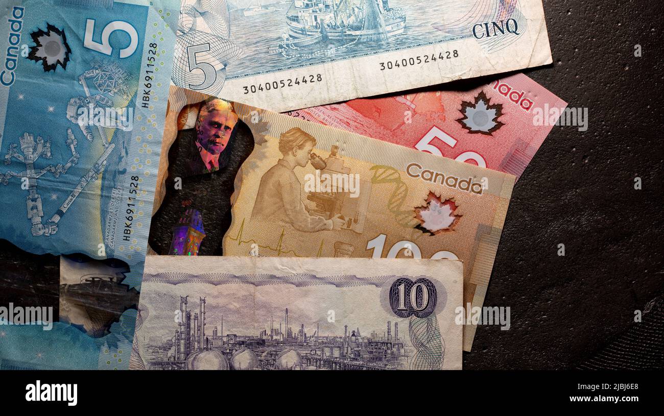 Toronto, Canada - October 30. 2021: Different canadian dollar banknotes ...