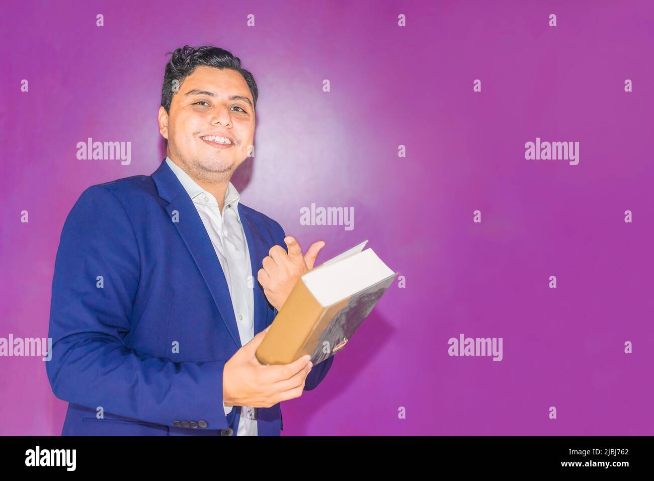Latin Nicaraguan university professor in blue suit on flat purple ...