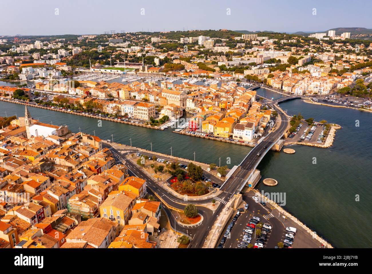 Aerial view of the administrative center with residential areas of the seaside town of Martigues ...