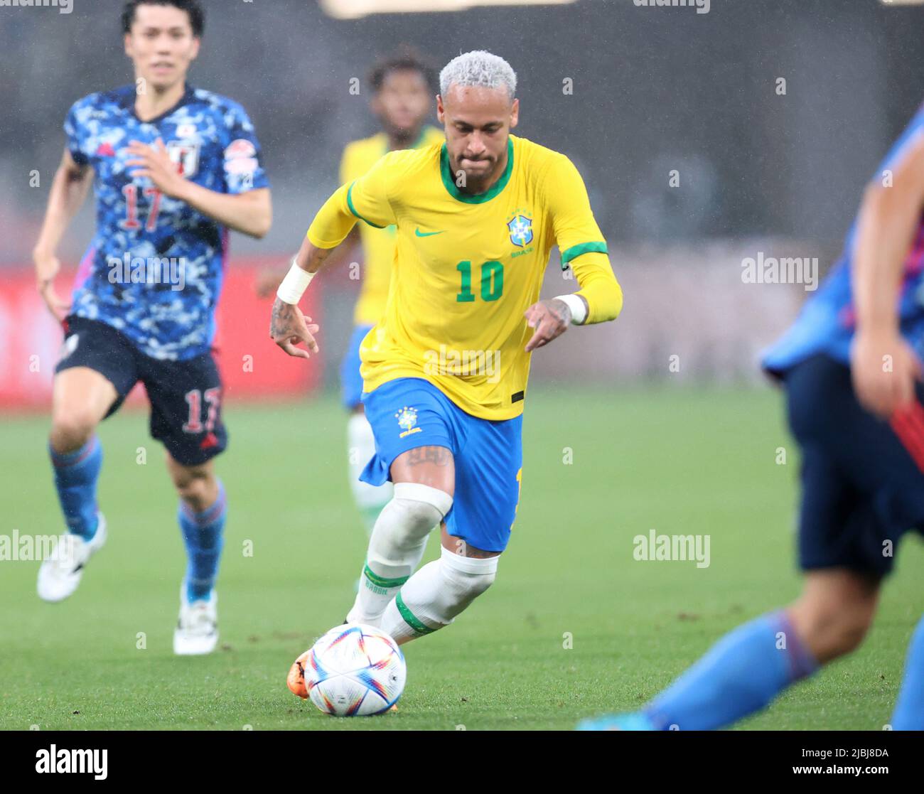 Tokyo, Japan. 6th June, 2022. Brazil's forward Neymar Jr. (C) carries ...