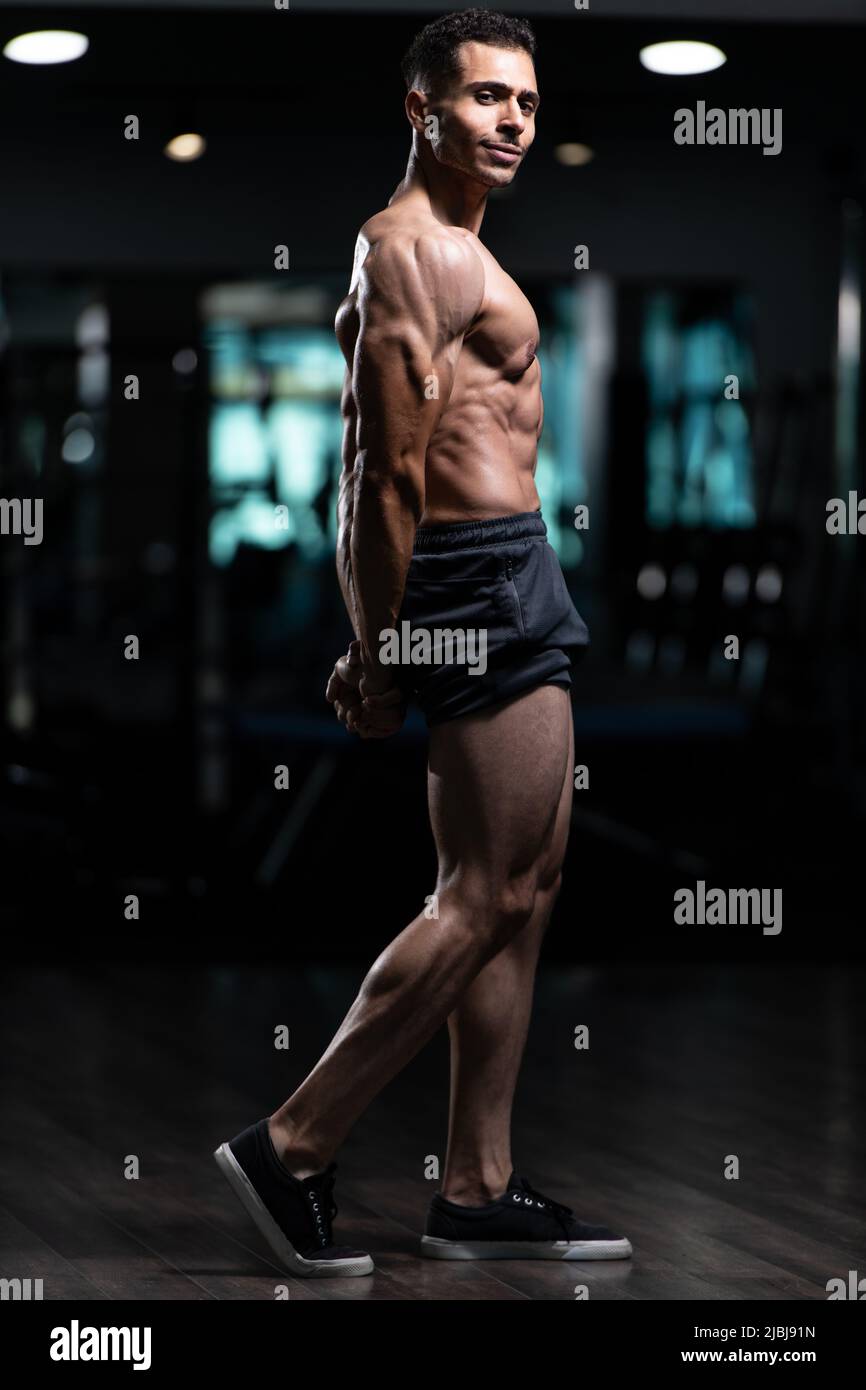 Young Man With Gynecomastia Breasts Problem Standing Strong In The Gym ...