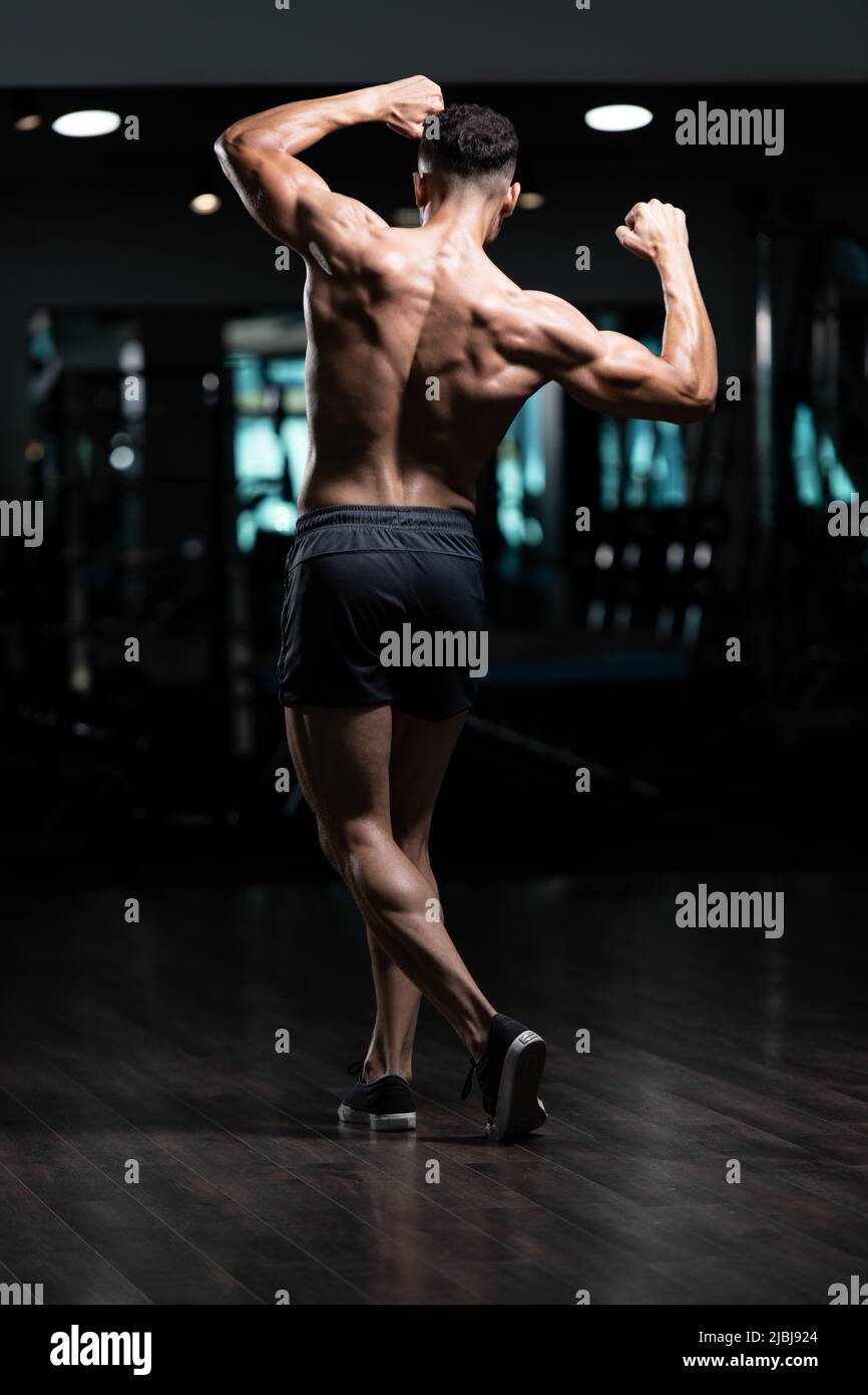 Portrait Of A Young Physically Fit Man Showing His Well Trained Body ...