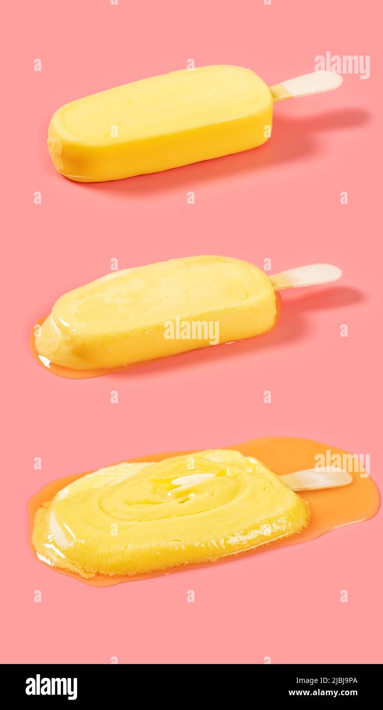 yellow popsicle in a melting process on pink background Stock Photo - Alamy