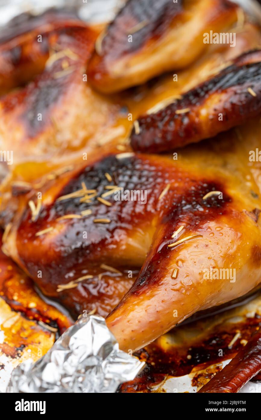 angle view fresh baked home-made chicken just came out from an oven ...