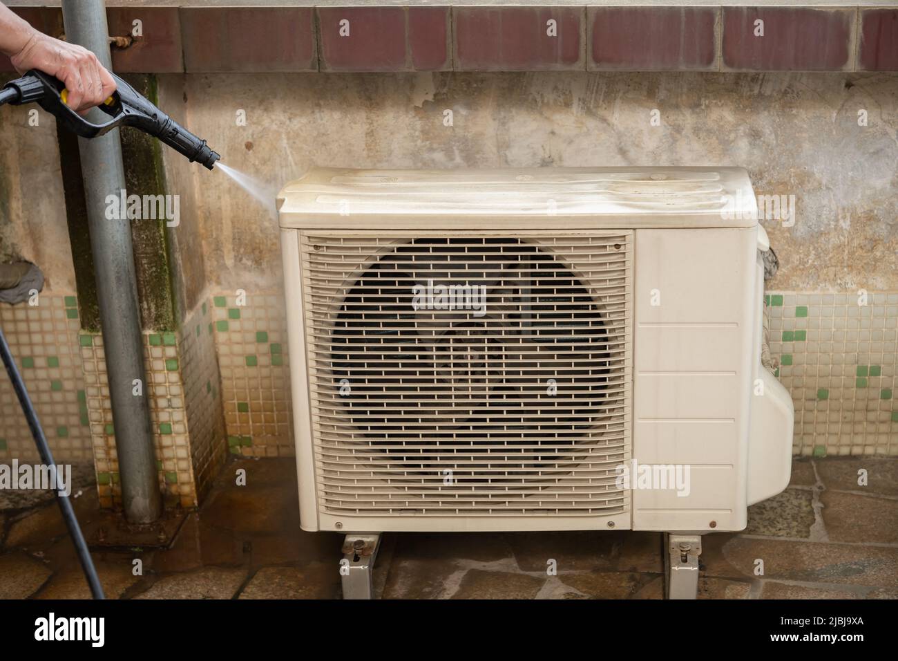 Air conditioner service indoors cleaning hi-res stock photography and ...