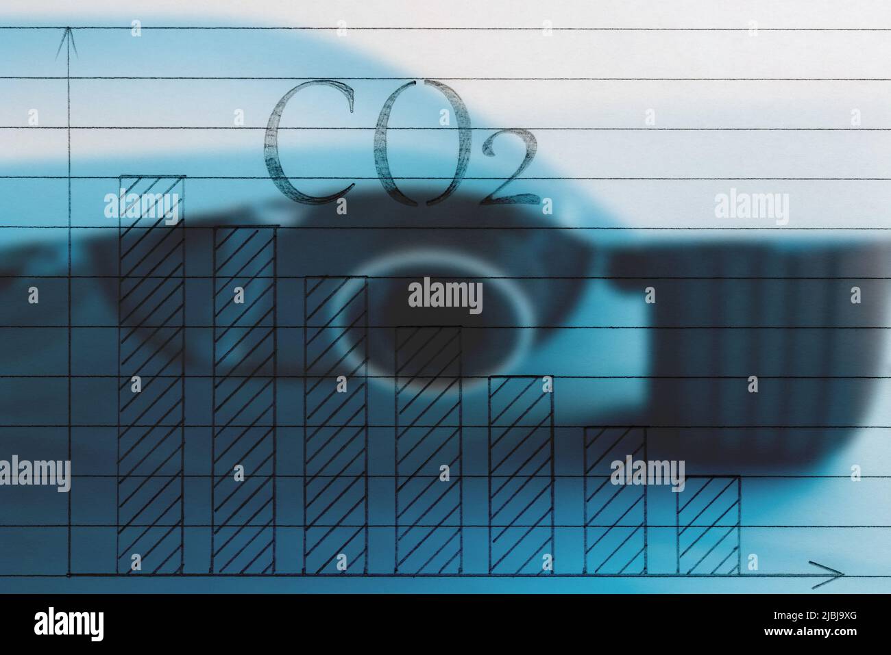 hand drawn decreasing columns showing CO2 reducing trend with blurred ...