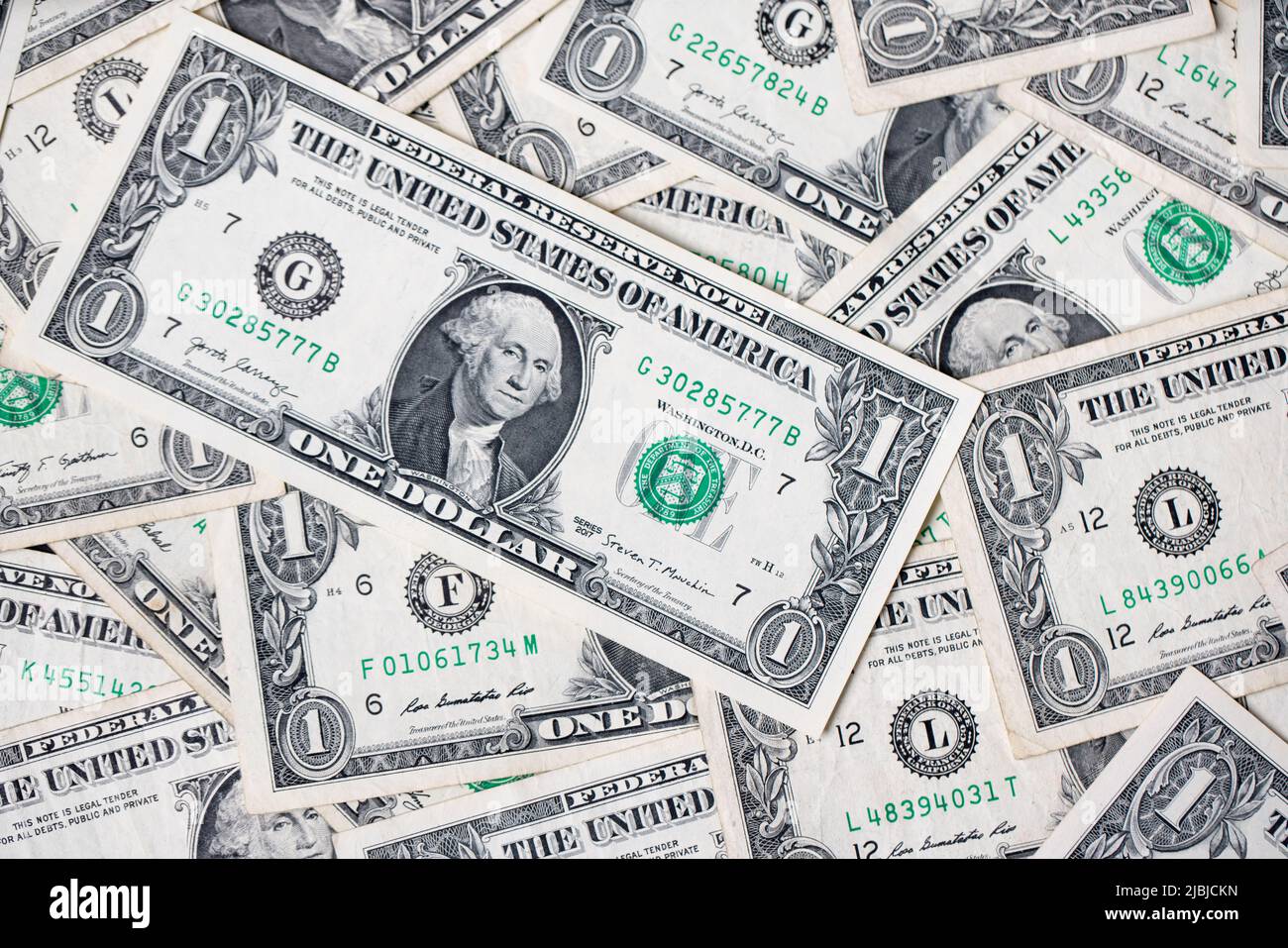 One dollar banknotes as background. Spread out 1 usd bills top down ...