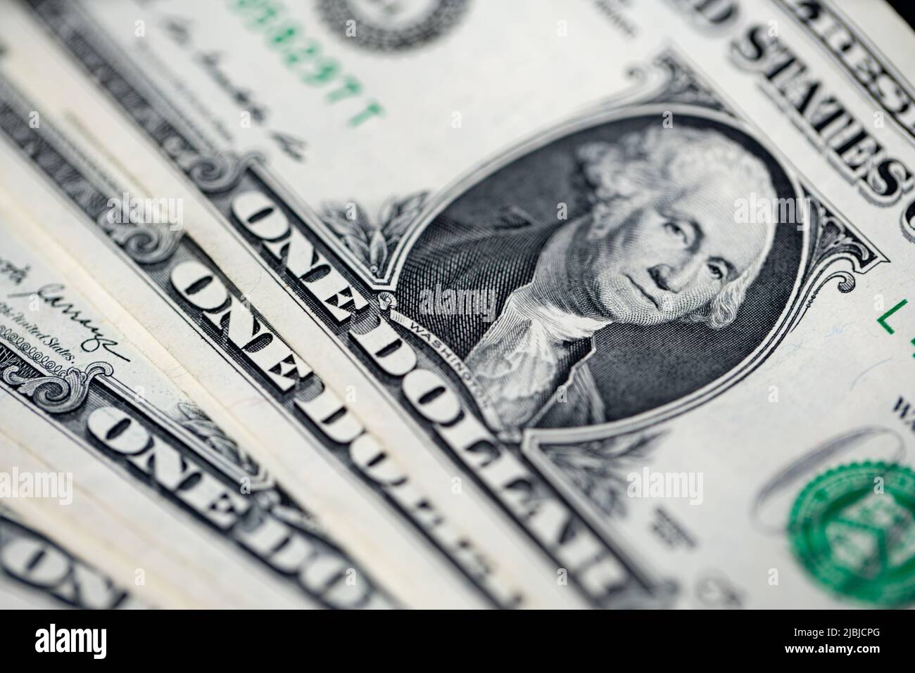Stacked dollars hi-res stock photography and images - Alamy