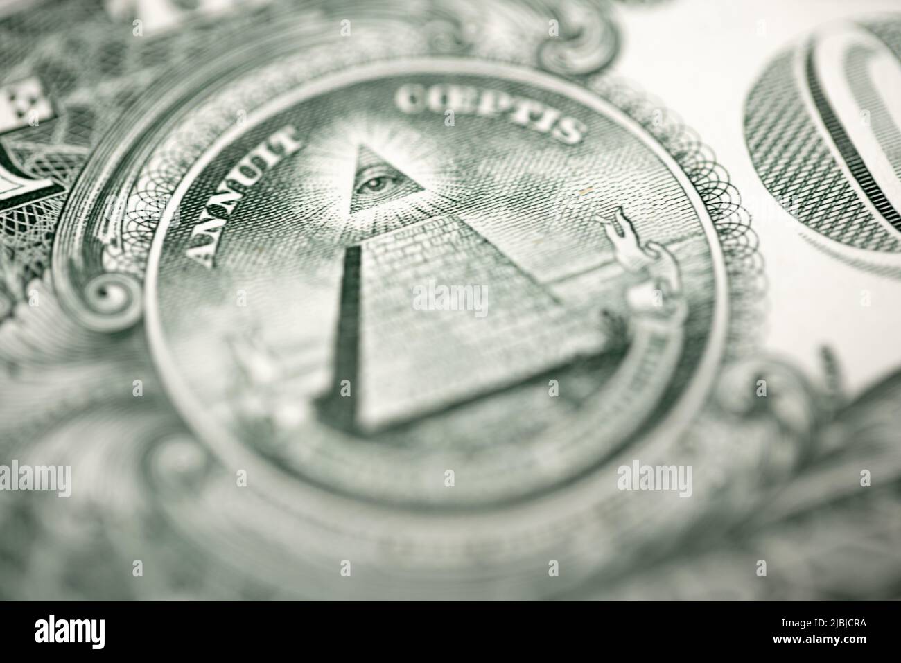 Eye on top of pyramid on the one dollar banknote from United states of ...