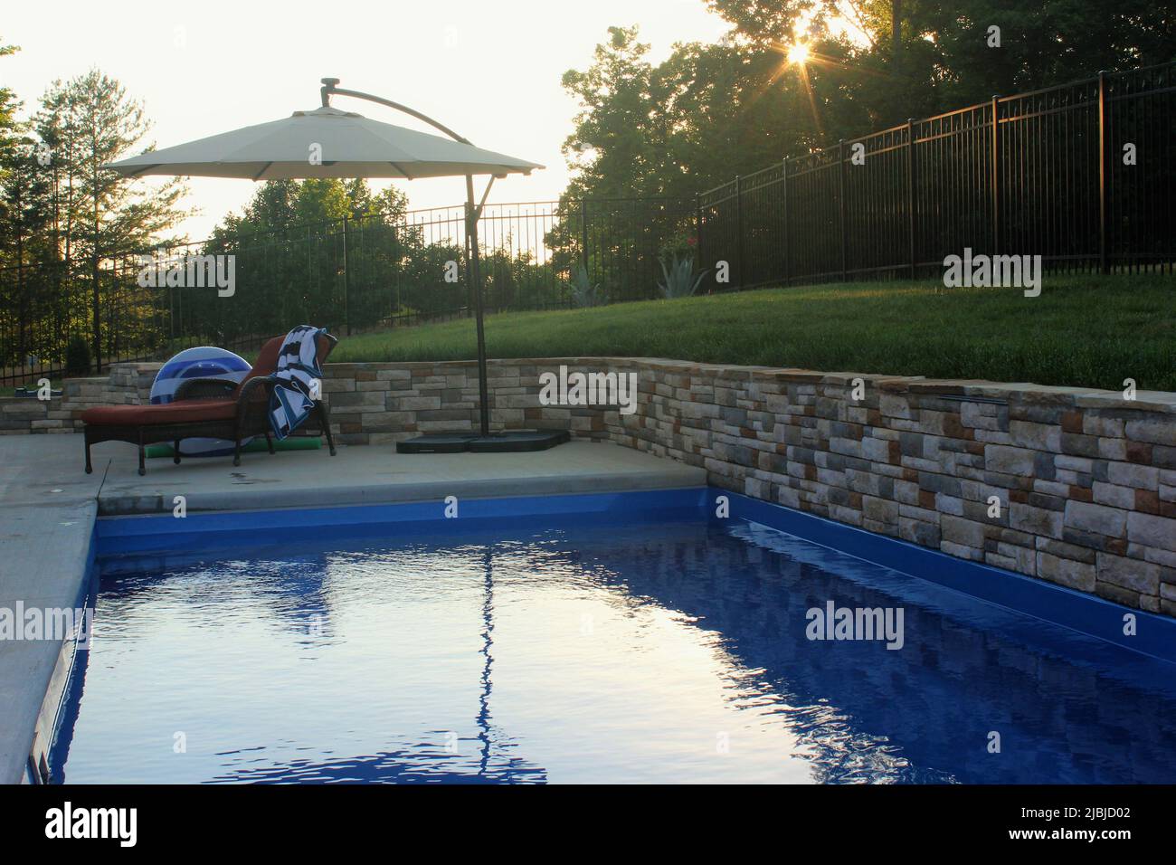 Back garden swimming pool hi-res stock photography and images - Alamy
