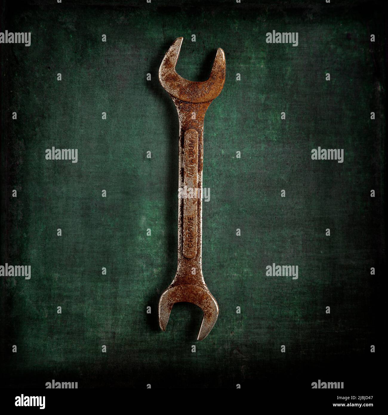Wrench tool corroded photography in top of paint background Stock Photo ...