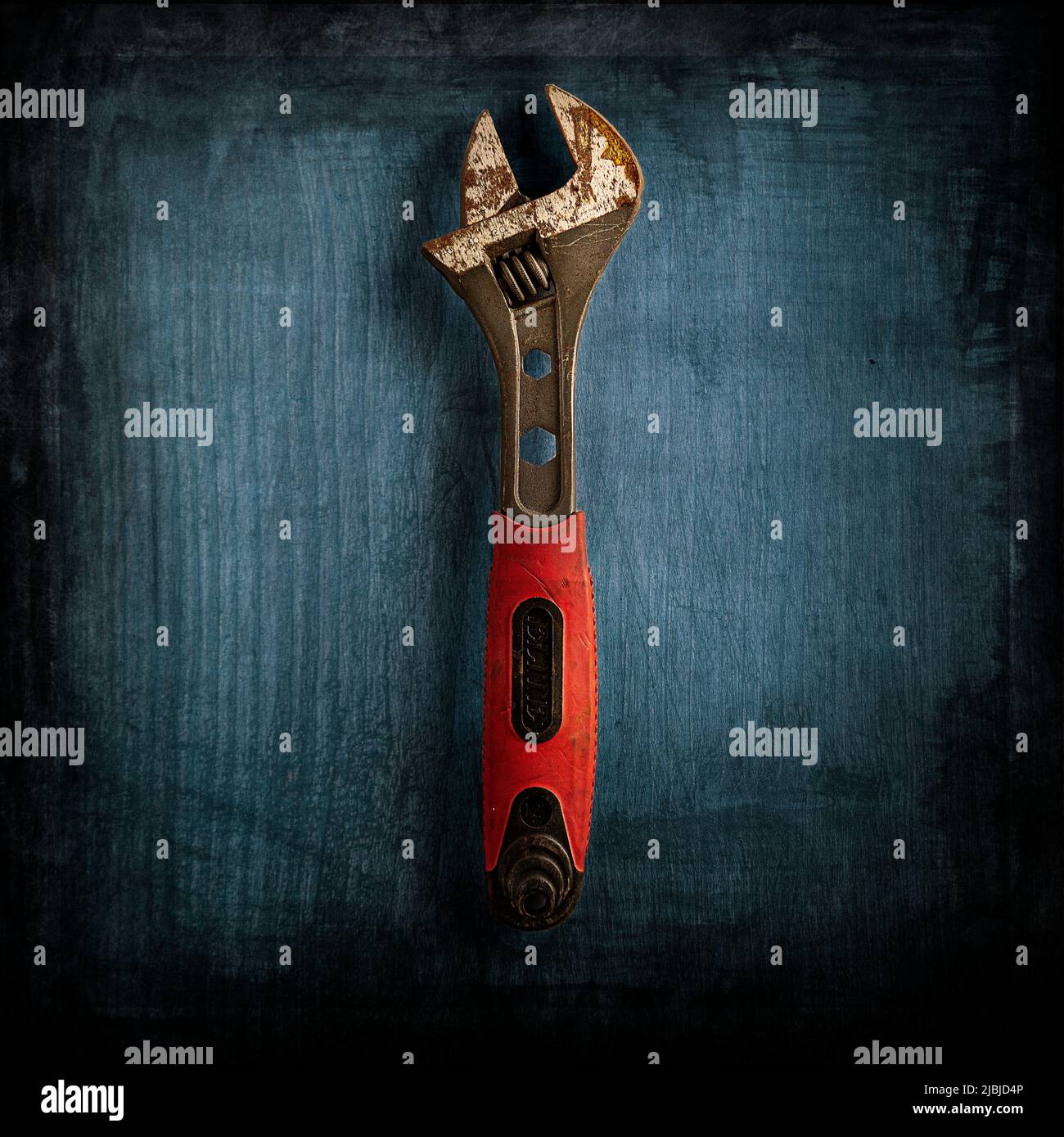 Old corroded adjustable spanner photography background Stock Photo - Alamy