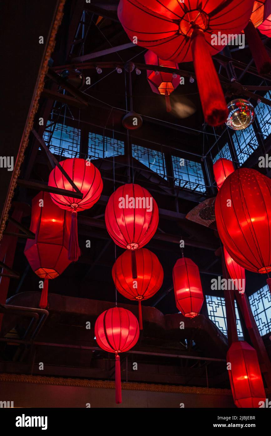 Chinese red lanterns glowing in hi-res stock photography and images - Alamy