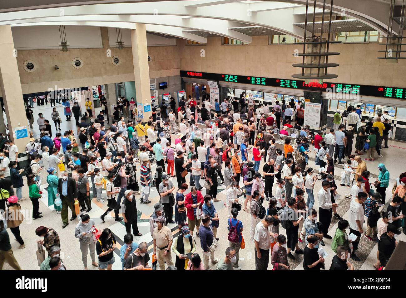 SHANGHAI, CHINA - JUNE 7, 2022 - People queue up at the registration ...