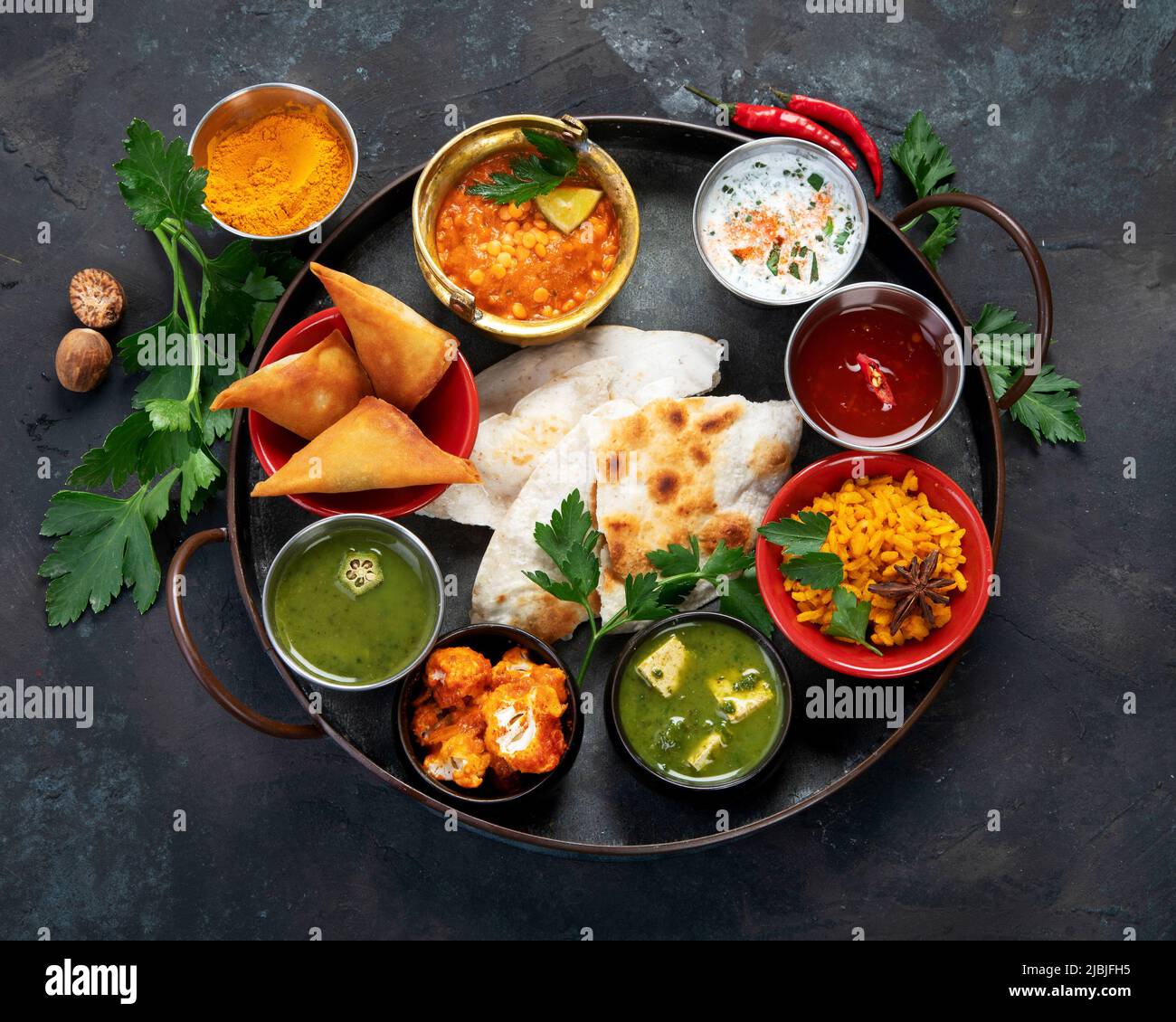 Indian Thali on dark background. Traditional food concept. Organic food ...