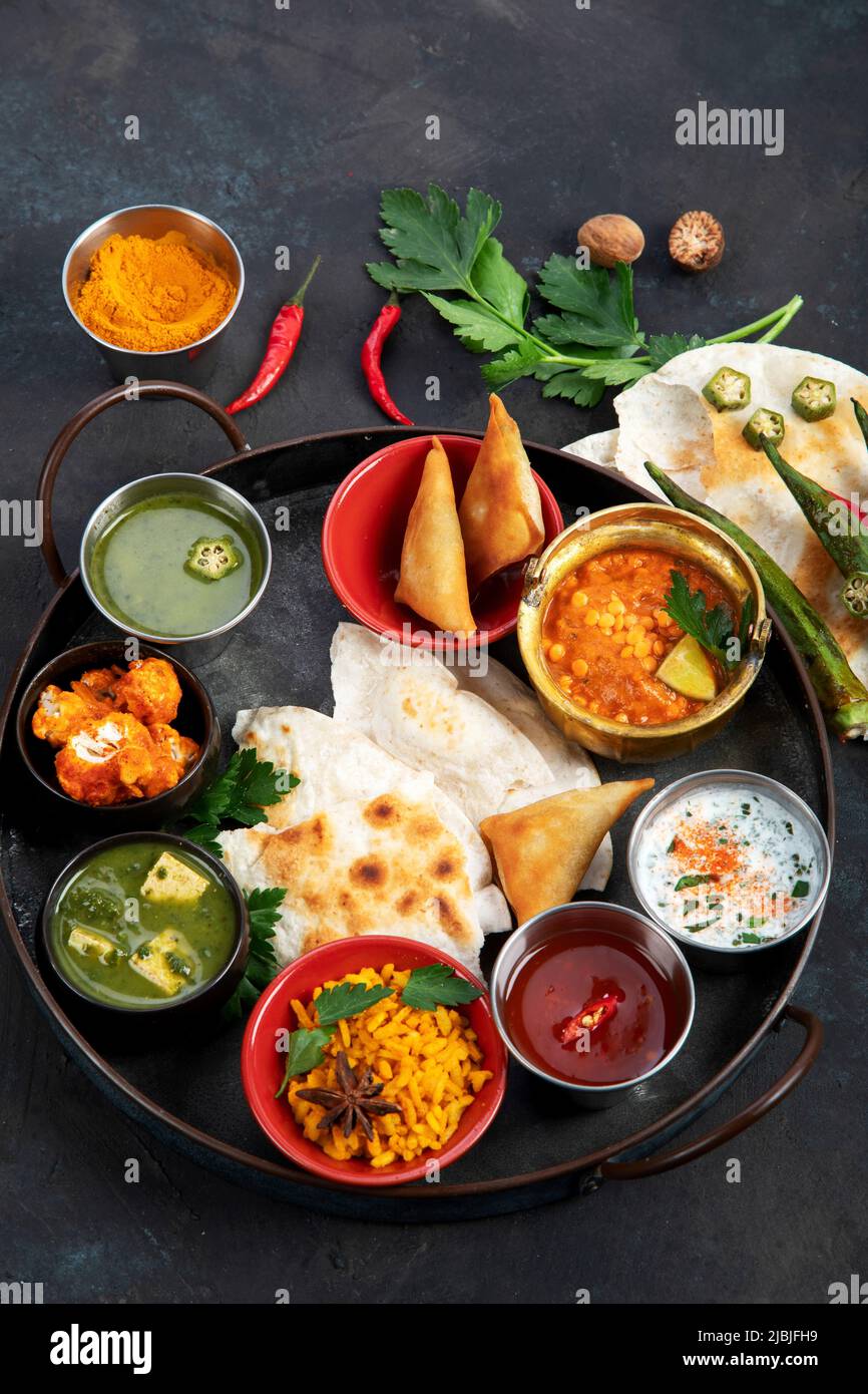 Indian Thali on dark background. Traditional food concept. Organic food ...