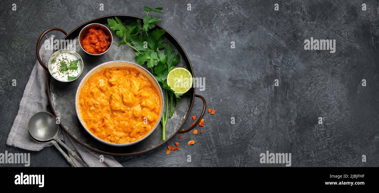 Indian curry on dark backgroound. Traditional food concept. Dishes and ...