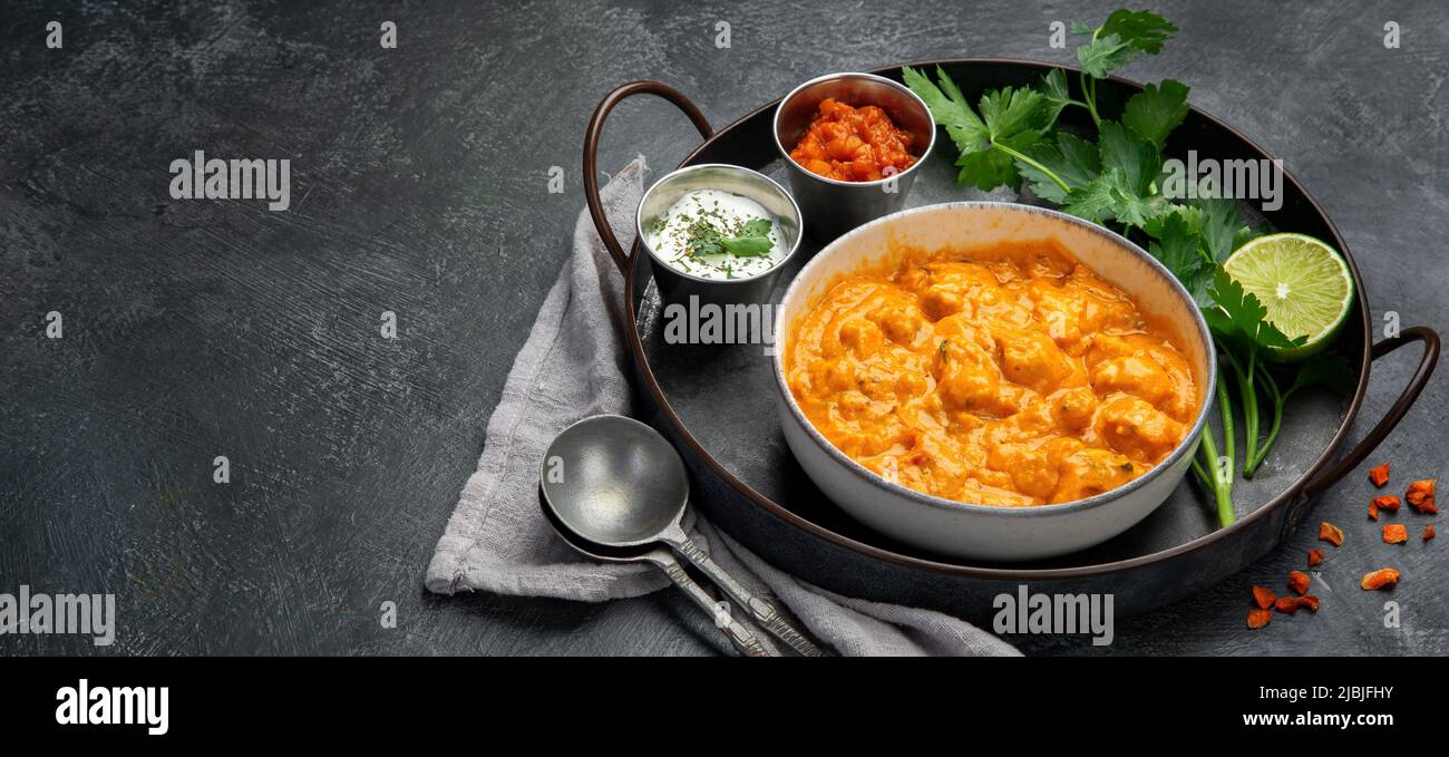 Indian curry on dark backgroound. Traditional food concept. Dishes and ...