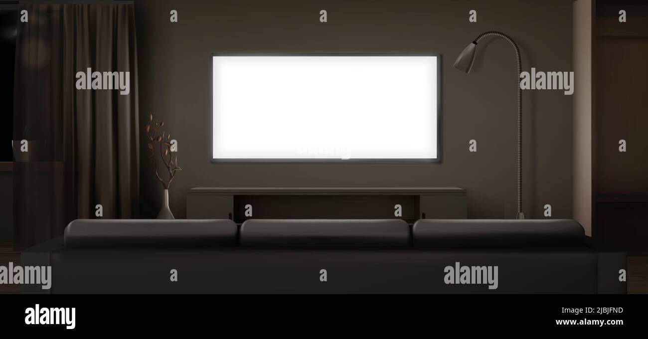 Wide lcd tv screen in dark living room at night. Modern house interior ...