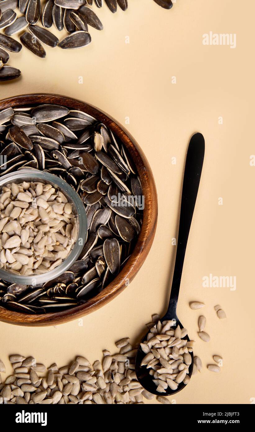 Sunflower oil and sunflower seeds on colourfull background. Organic ...