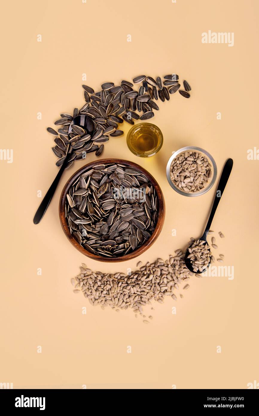 Sunflower oil and sunflower seeds on colourfull background. Organic ...