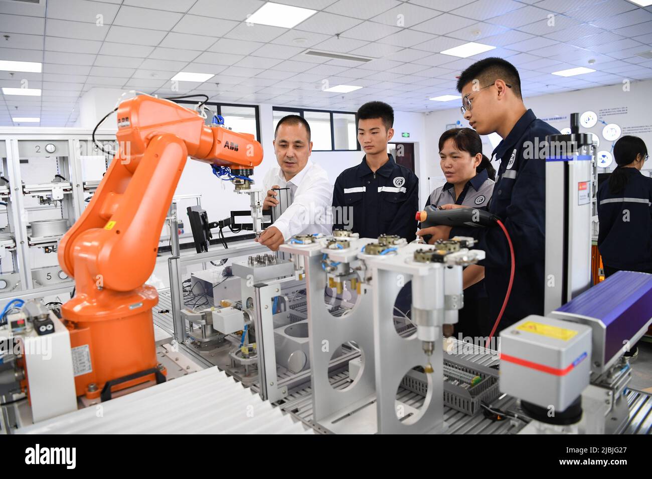 LUZHOU, CHINA - JUNE 3, 2022 - Teachers guide the team of Luzhou ...