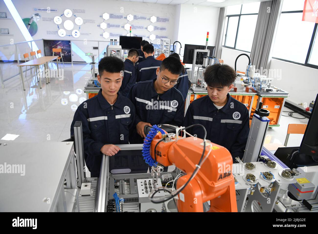 LUZHOU, CHINA - JUNE 3, 2022 - Teachers guide the team of Luzhou ...