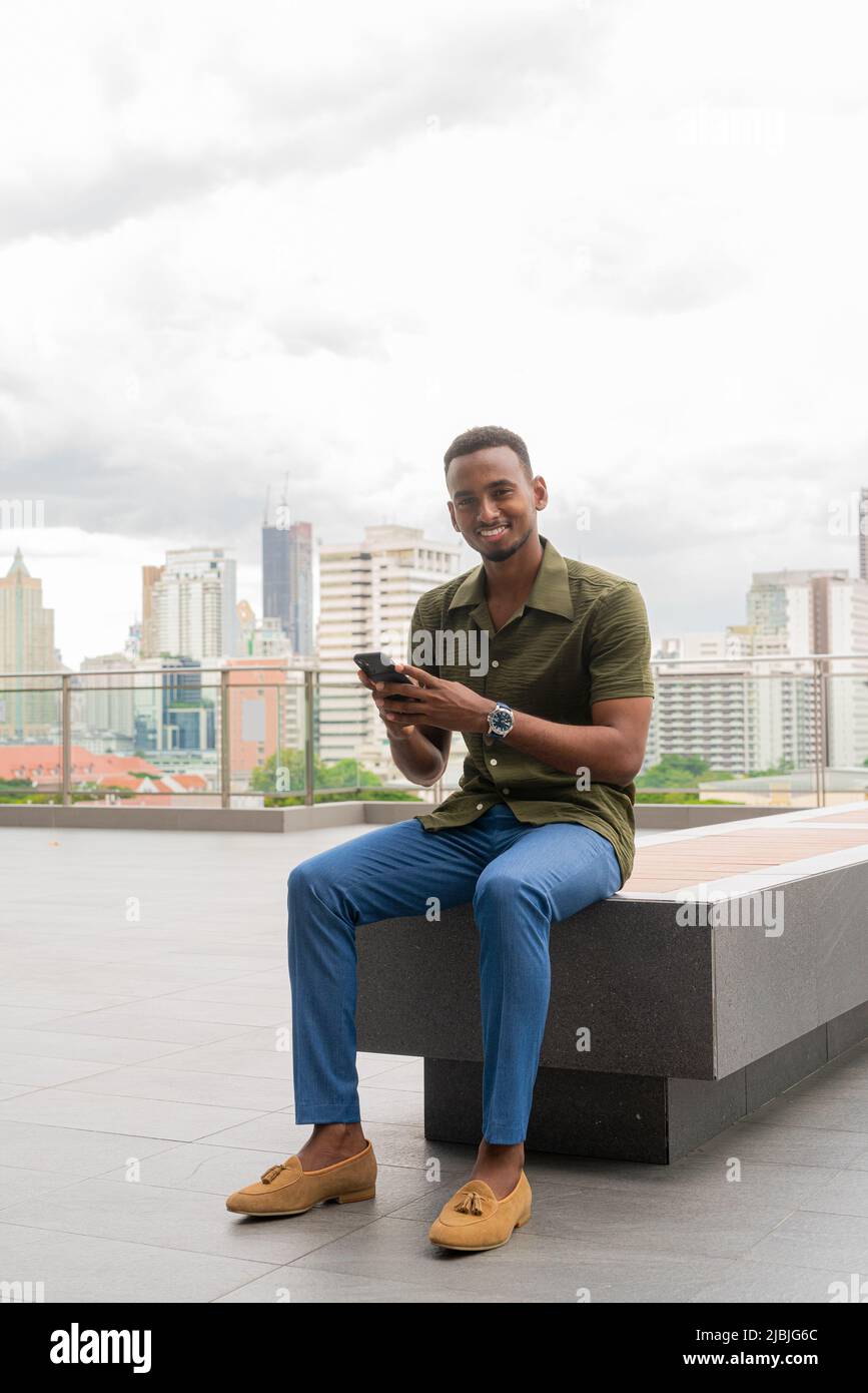 Portrait of handsome young African man Stock Photo - Alamy