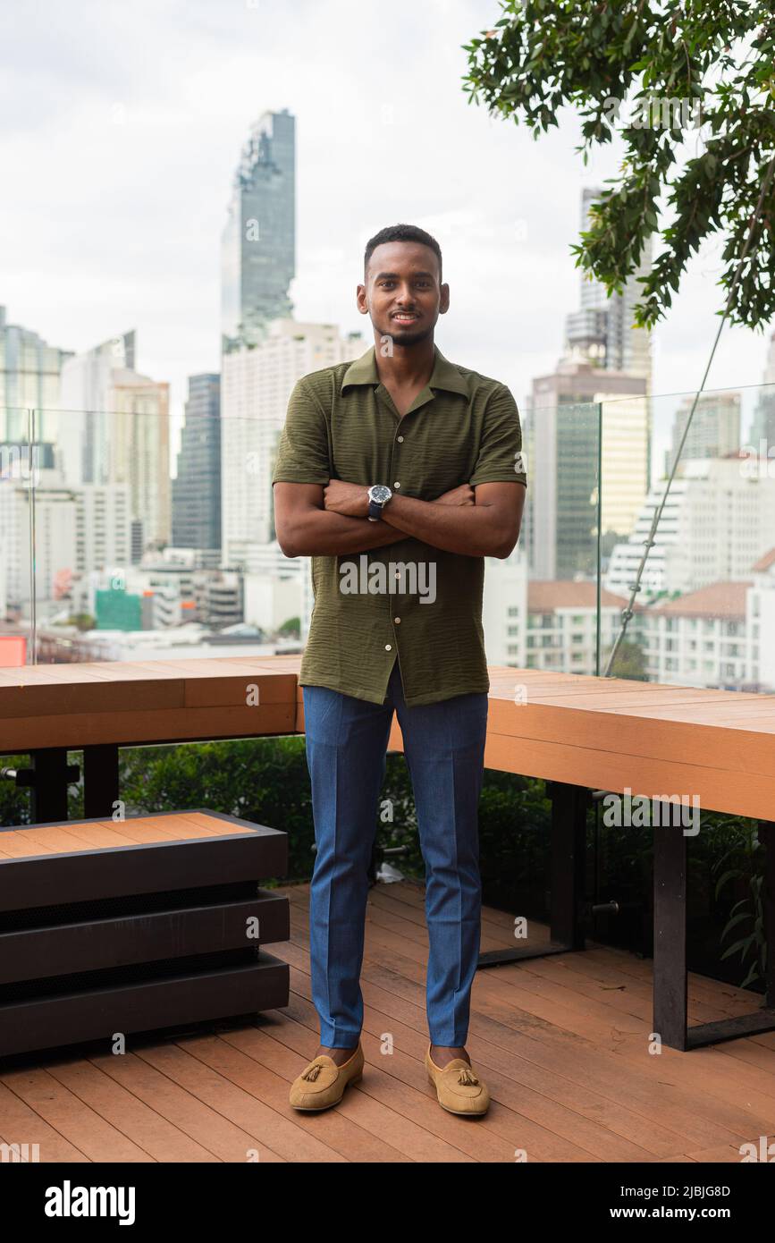 Portrait of handsome young African man Stock Photo - Alamy