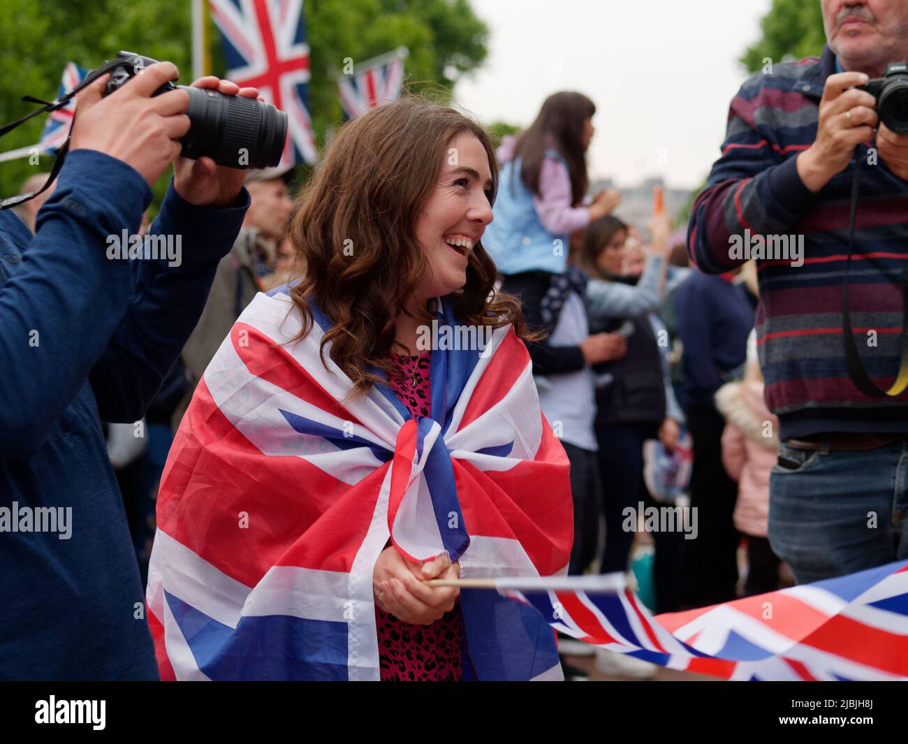 Woman draped in english flag hi-res stock photography and images - Alamy