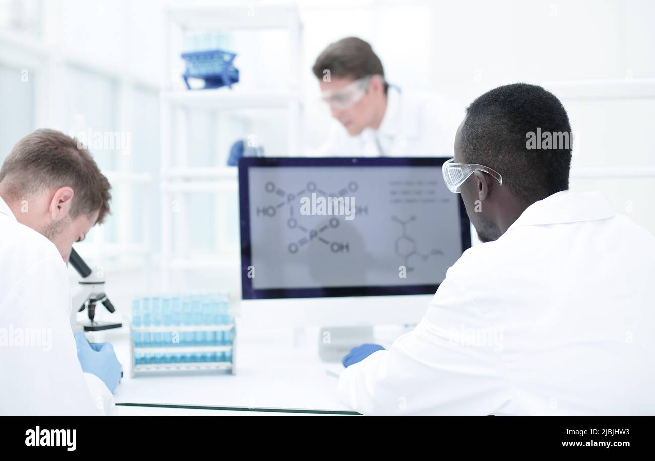 group of scientists in a modern laboratory Stock Photo - Alamy